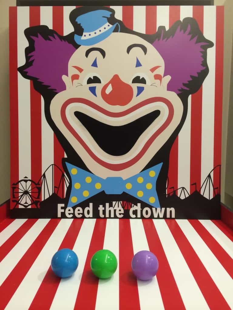 feed the clown carnival game stall rental | Carnival World